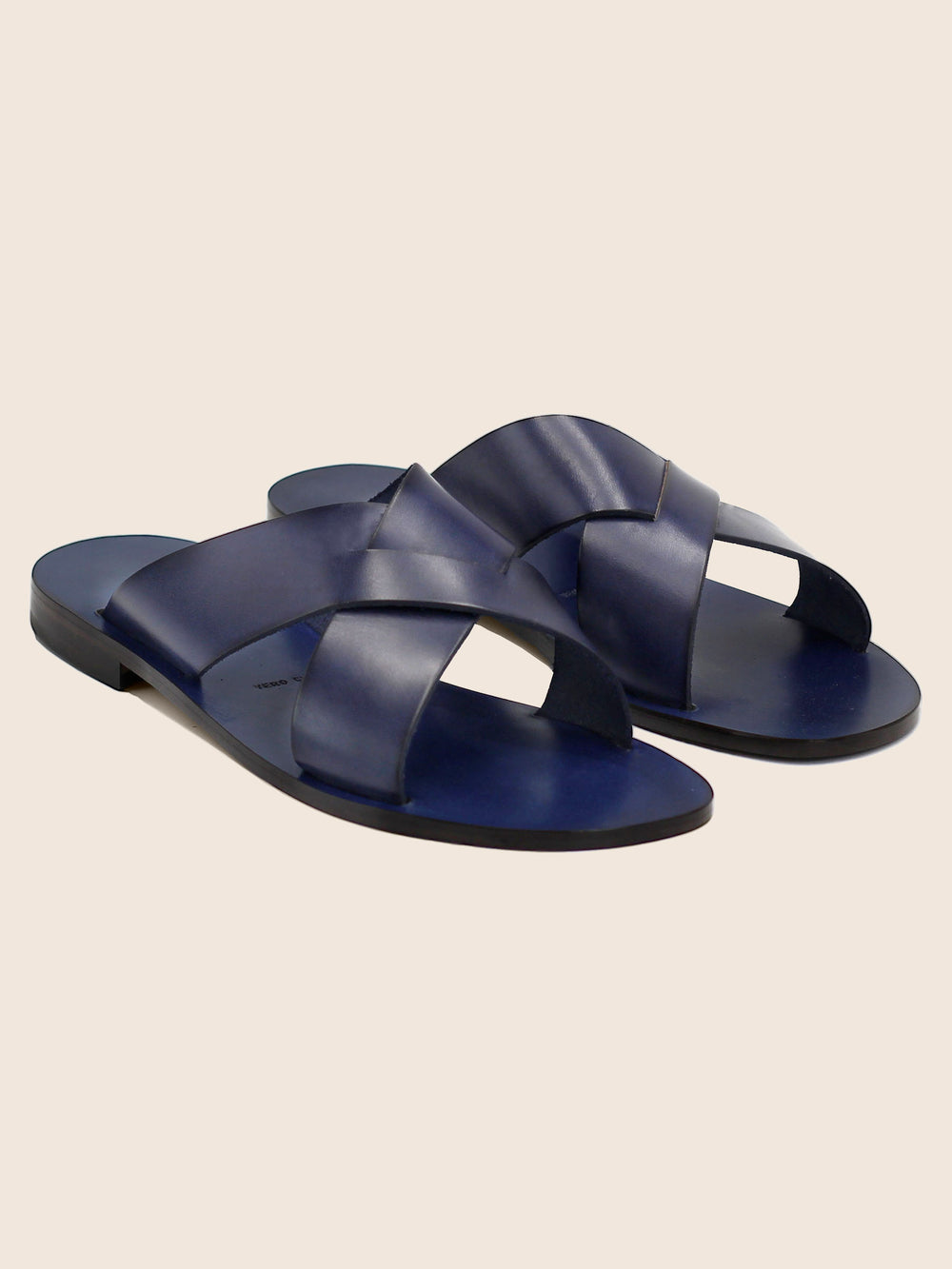 Blue vegetable-tanned leather flat criss-cross mules | JULES & JENN