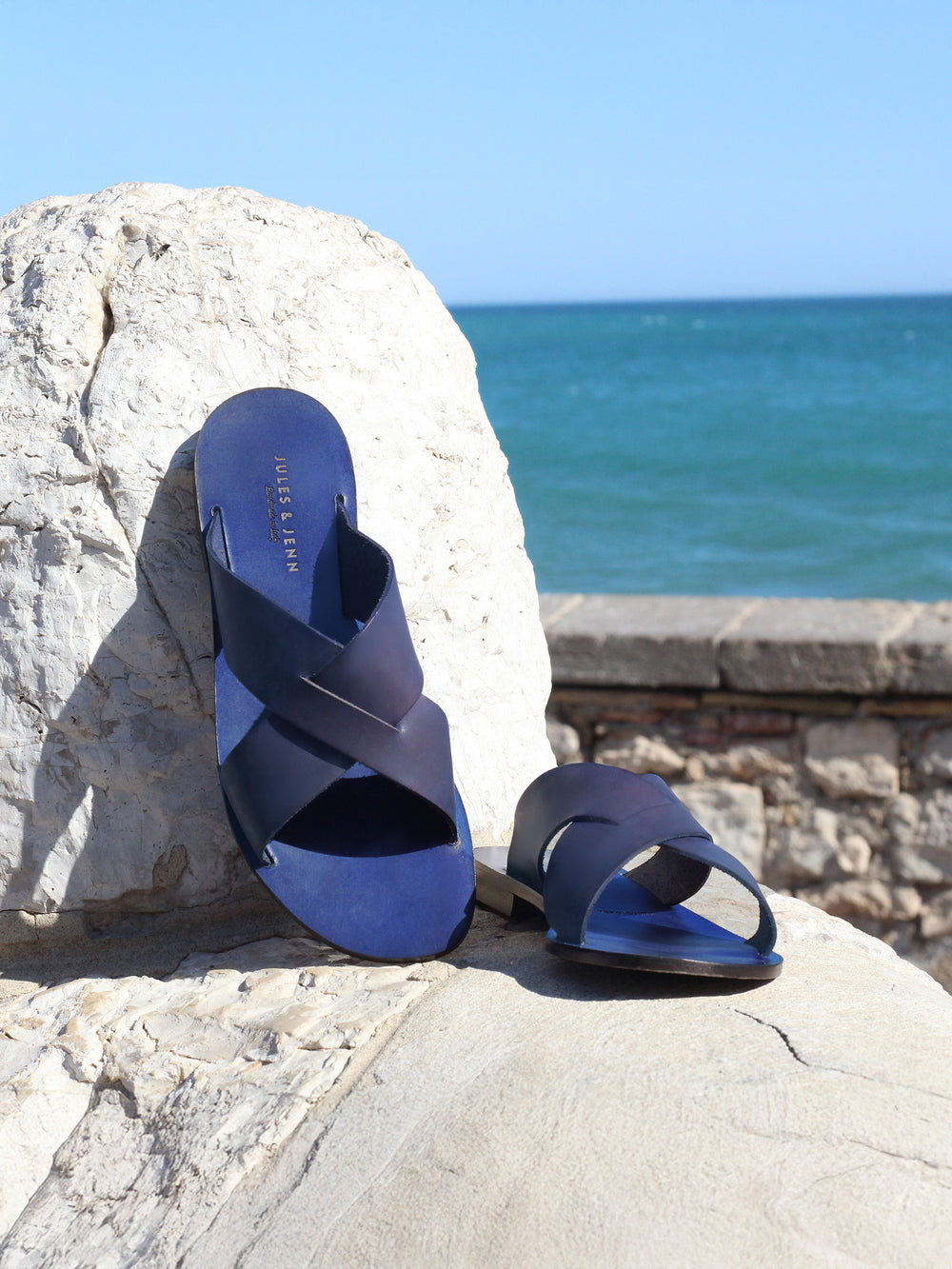 Blue vegetable-tanned leather flat criss-cross mules | JULES & JENN